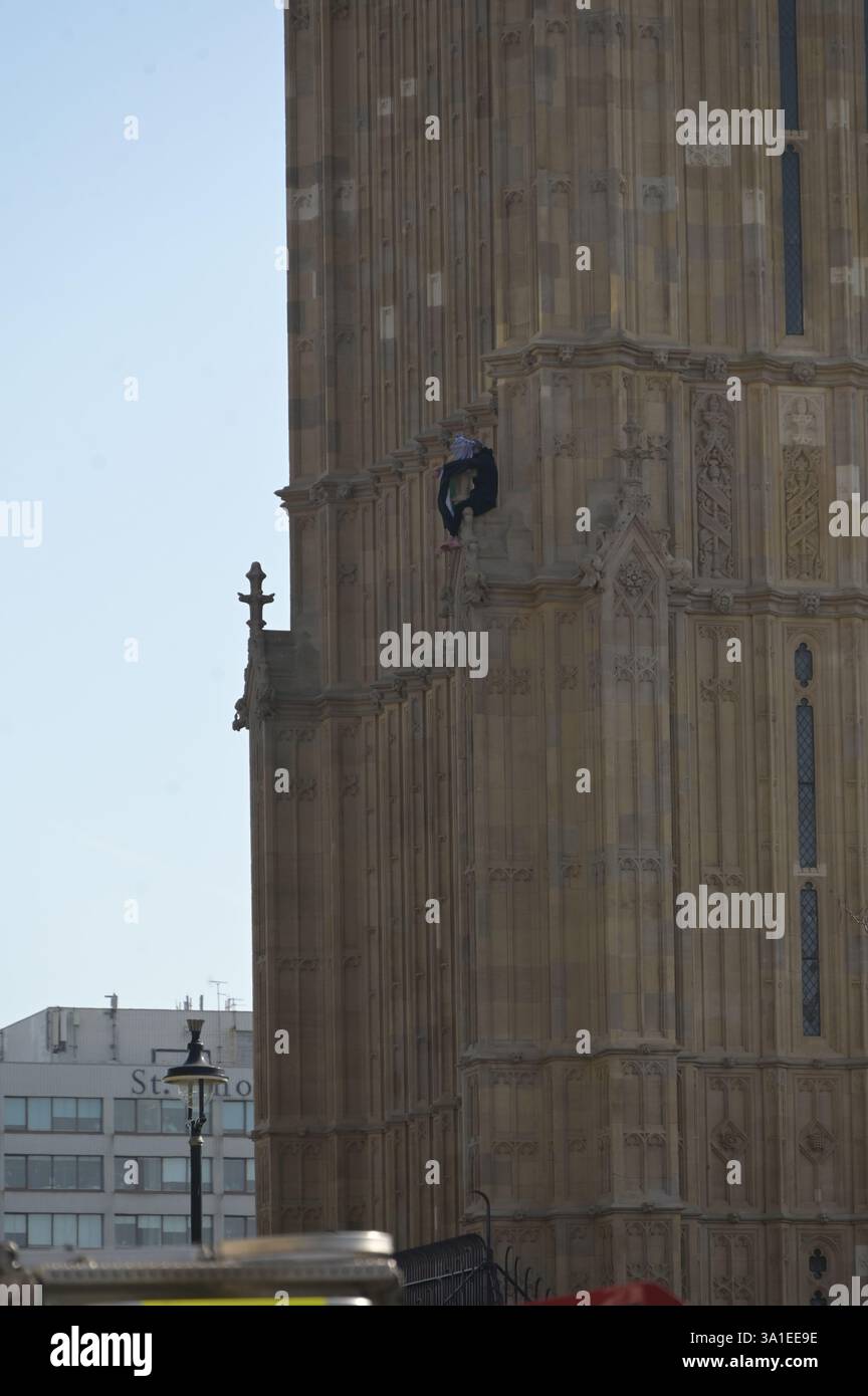 LONDON, ENGLAND: 8th March 2025: A barefoot protestor holding a ...
