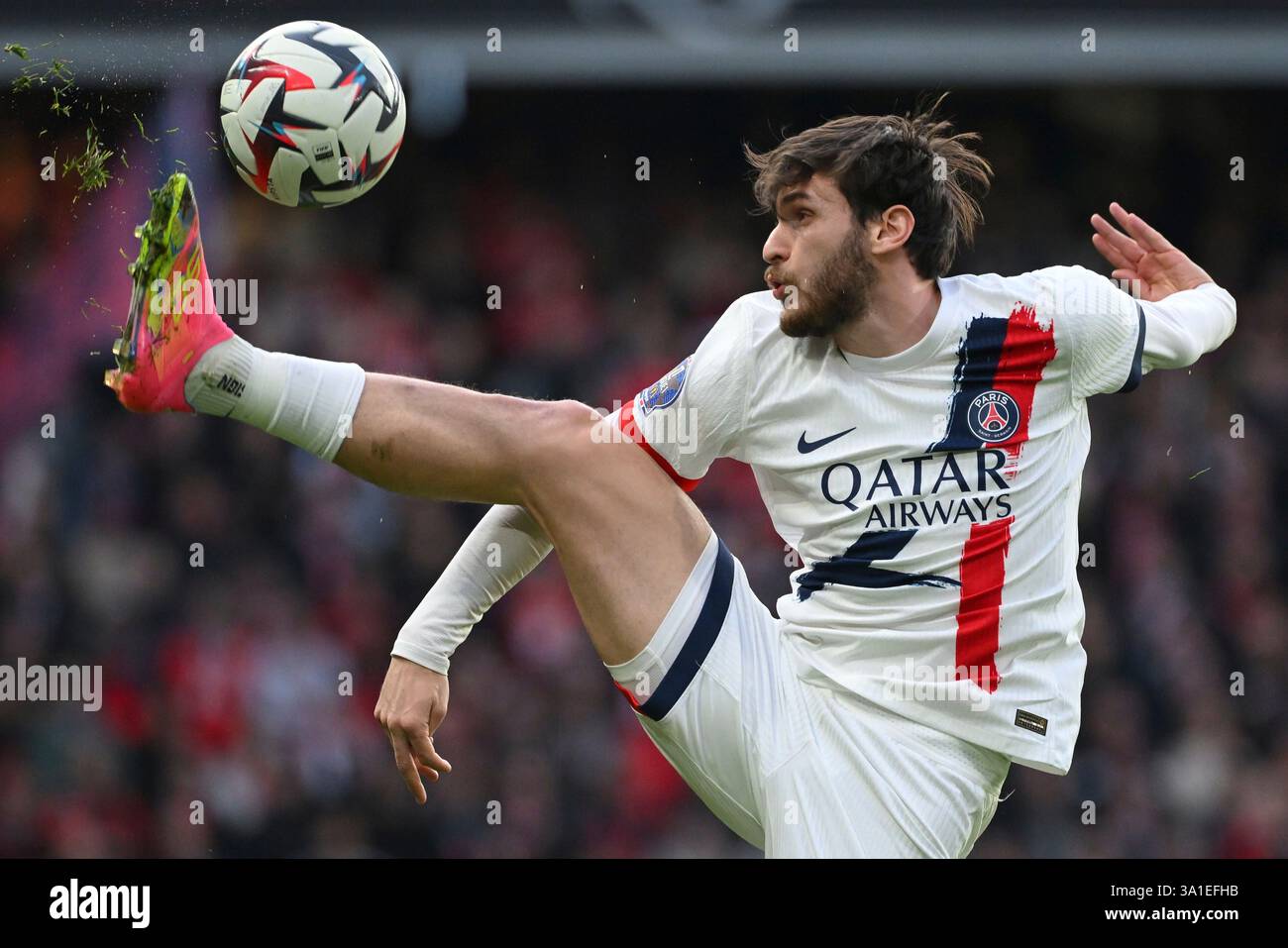 PSG's Khvicha Kvaratskhelia takes the ball during the French League One ...