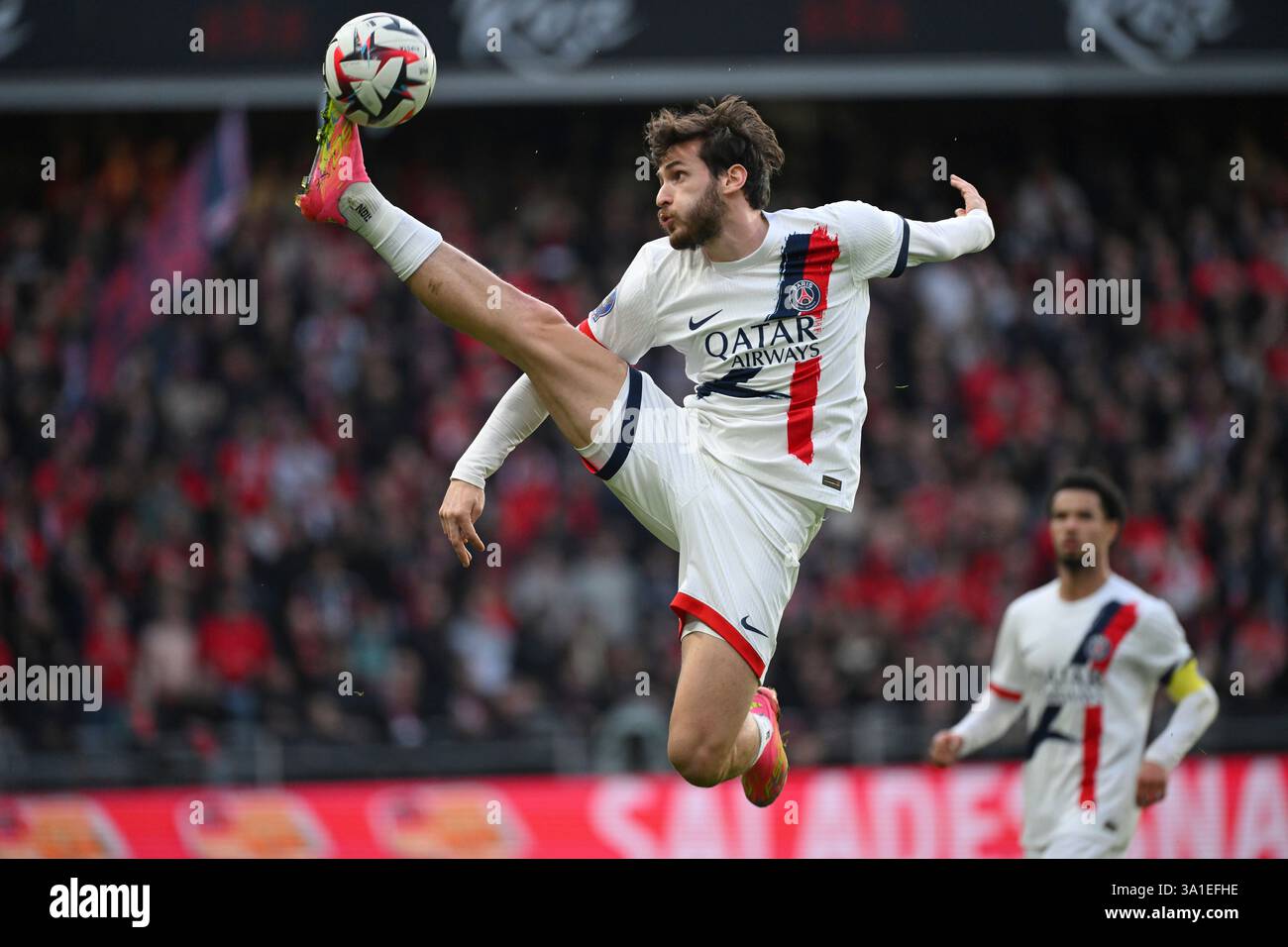 PSG's Khvicha Kvaratskhelia takes the ball during the French League One ...