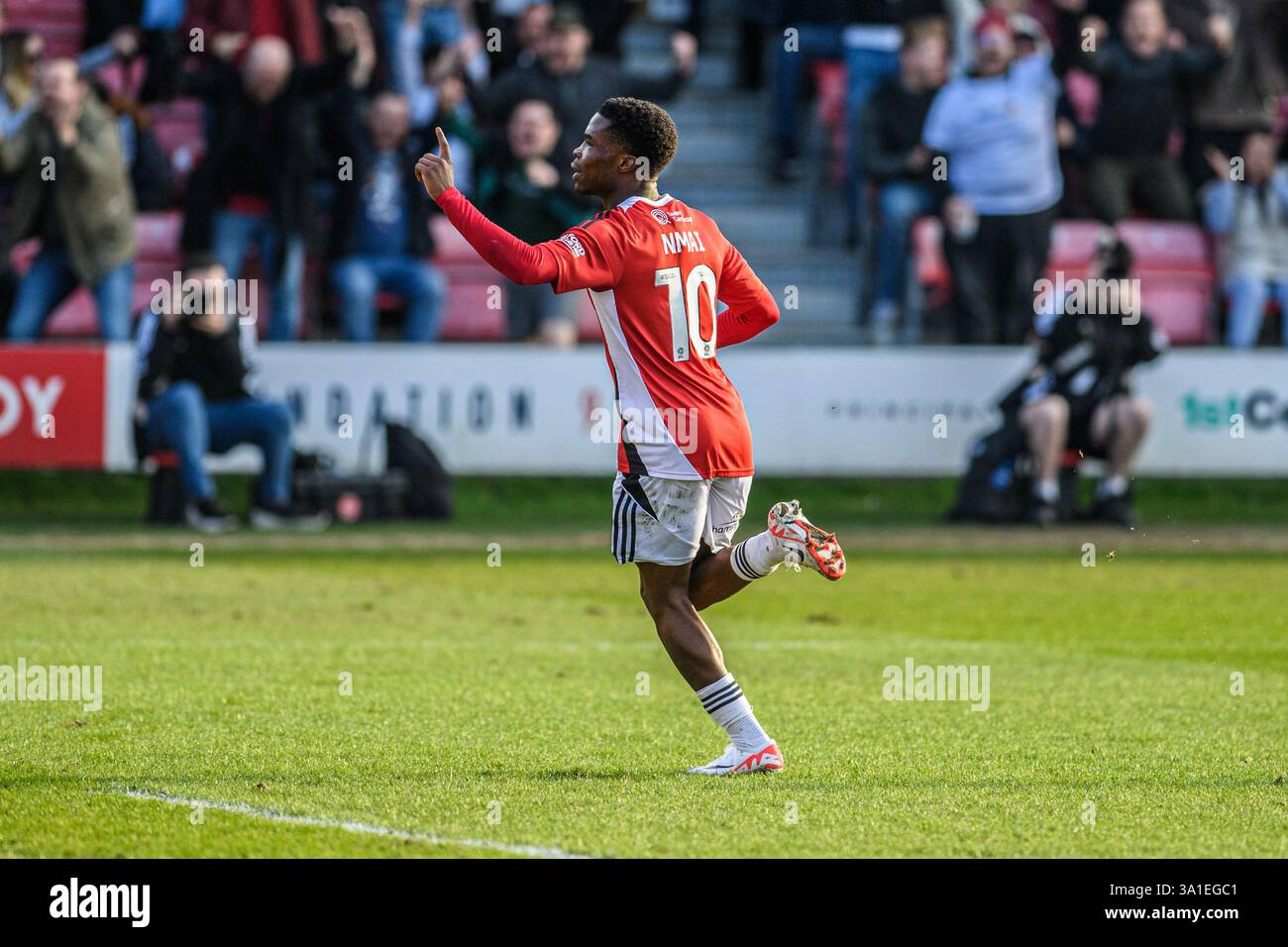 Kelly Nmai of Salford City FC celebrates scoring his side's first goal ...