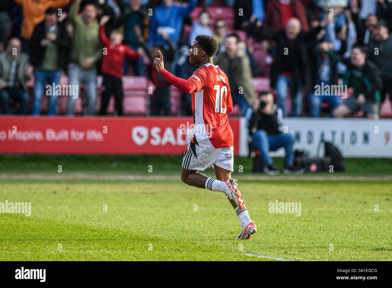 Kelly Nmai of Salford City FC celebrates scoring his side's first goal ...