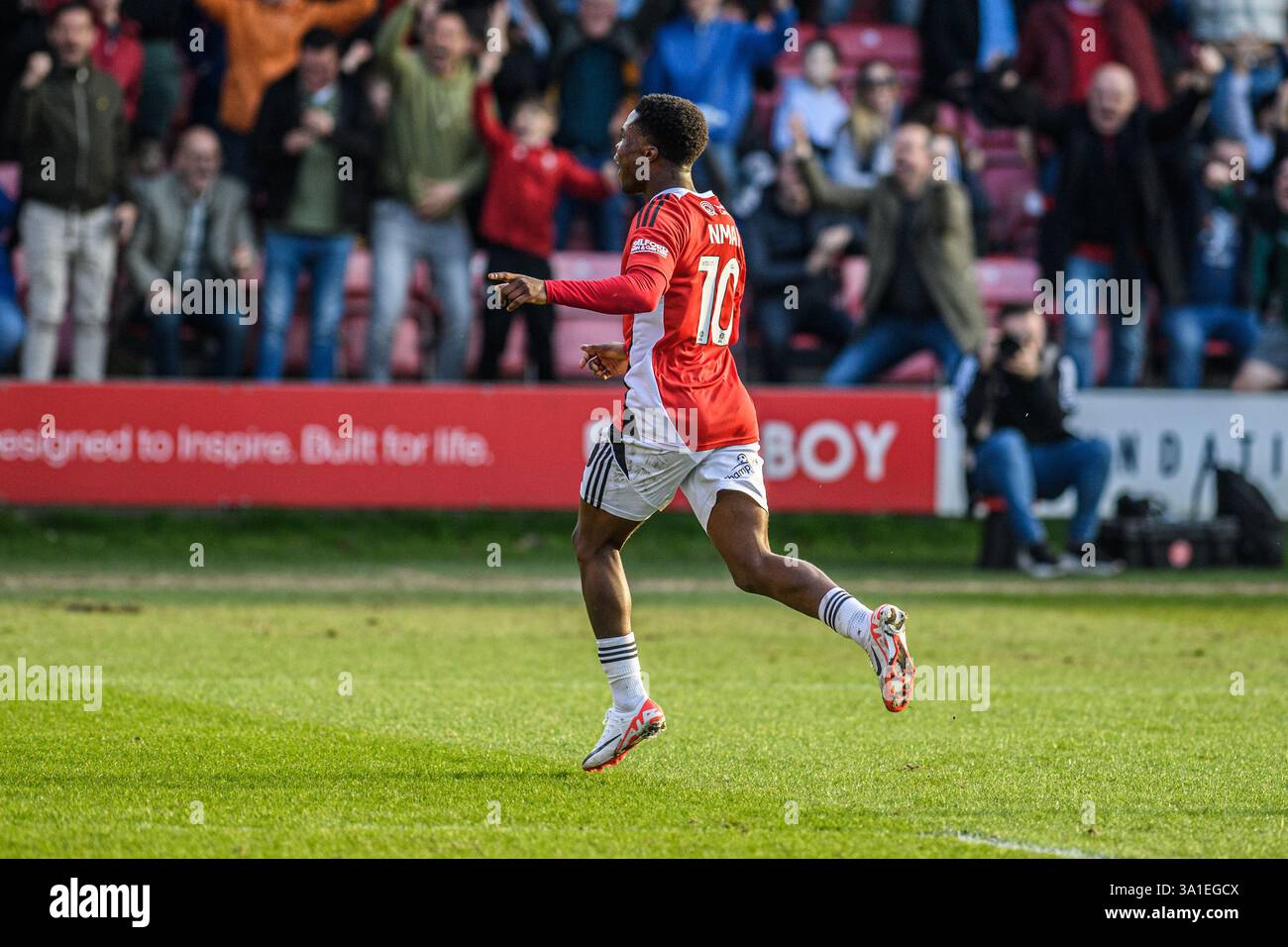 Kelly Nmai of Salford City FC celebrates scoring his side's first goal ...