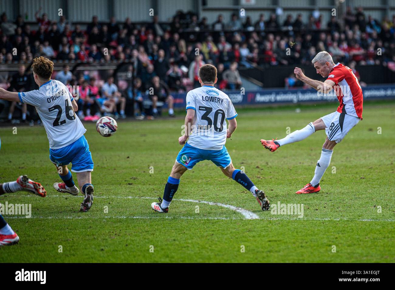 Matty Lund of Salford City FC tries a shot on goal during the Sky Bet ...