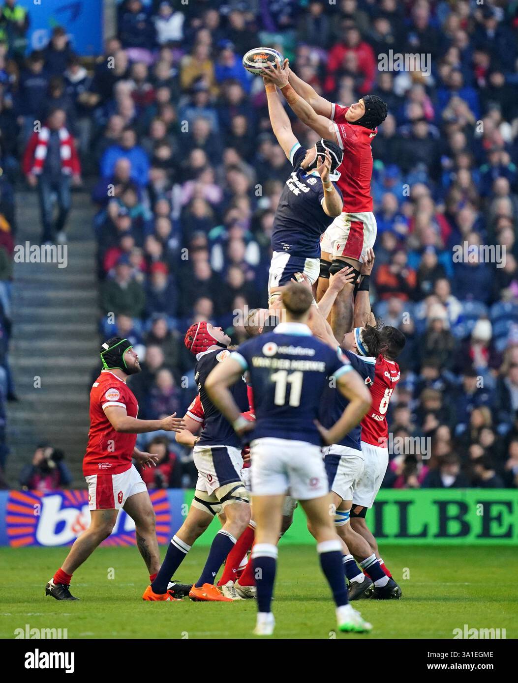 Scotland's Jonny Gray and Wales' Dafydd Jenkins compete in a line-out during the Guinness Men's ...