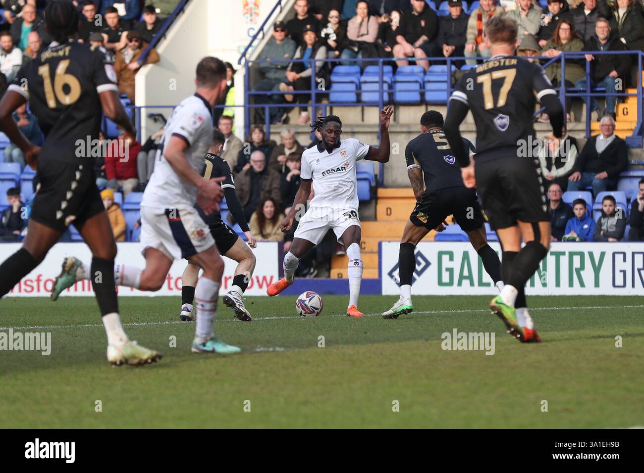 Prenton Park. UK. 8th Mar 2025. Omari Patrick of Tranmere Rovers scores ...