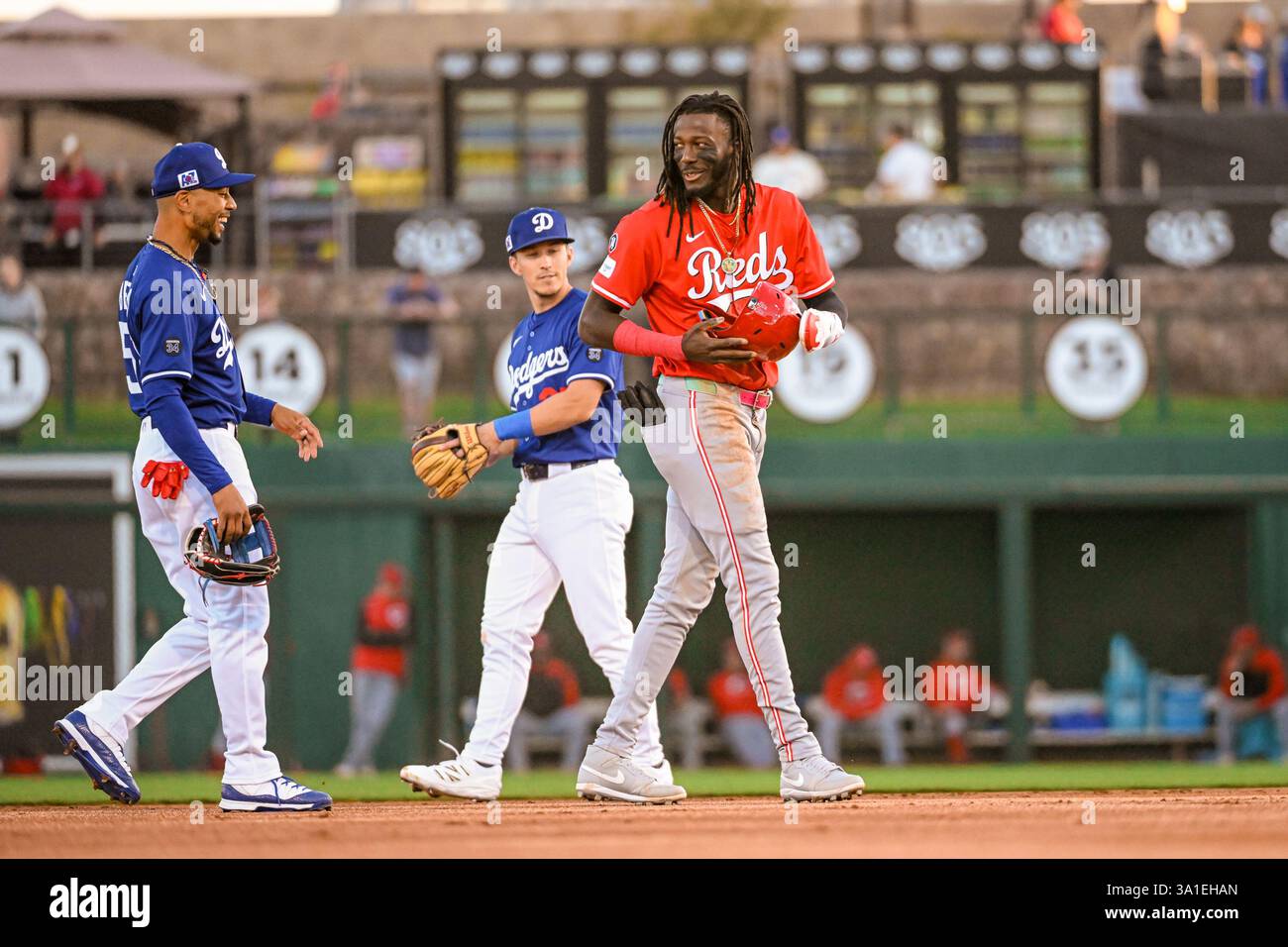 Cincinnati Reds shortstop Elly De La Cruz (44) gets his helmet back ...