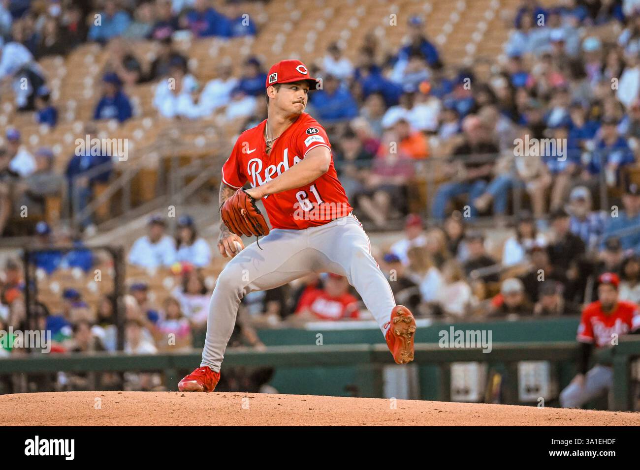 Cincinnati Reds pitcher Chase Petty (61) throws against the Los Angeles ...
