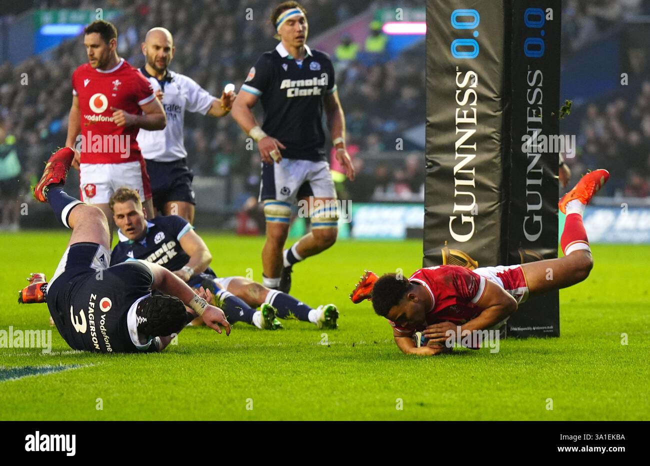 Wales's Ben Thomas scores their side's second try of the game during ...