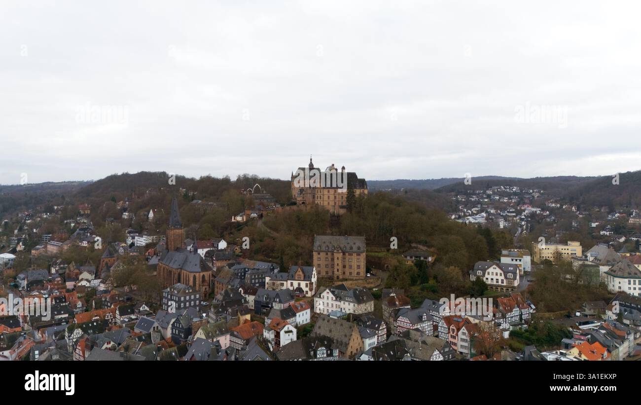 High-angle view of Marburg, Germany, featuring Marburg Castle on a hill ...