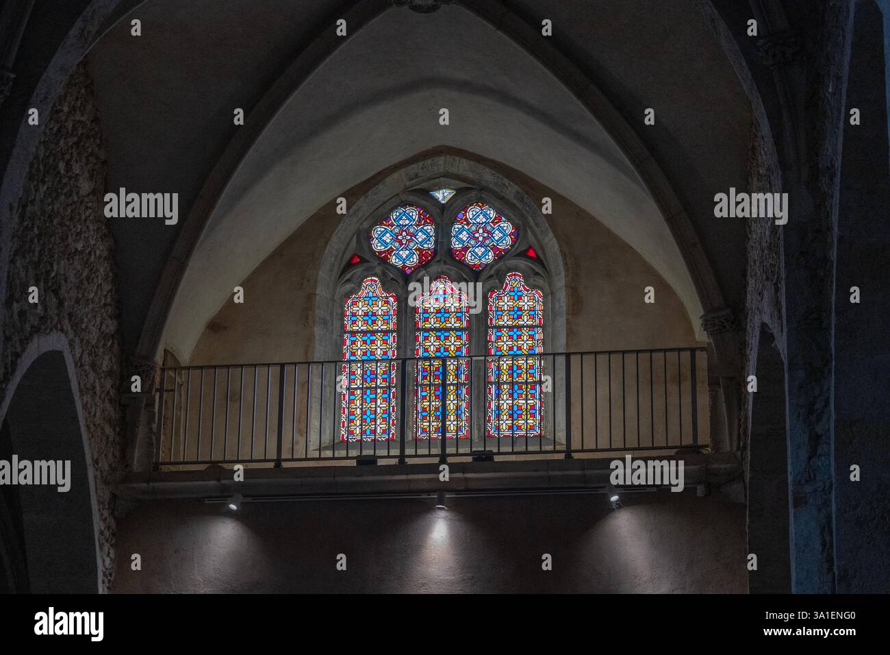 The chemin de ronde under the stained glass window in St Mary-Magdelene ...