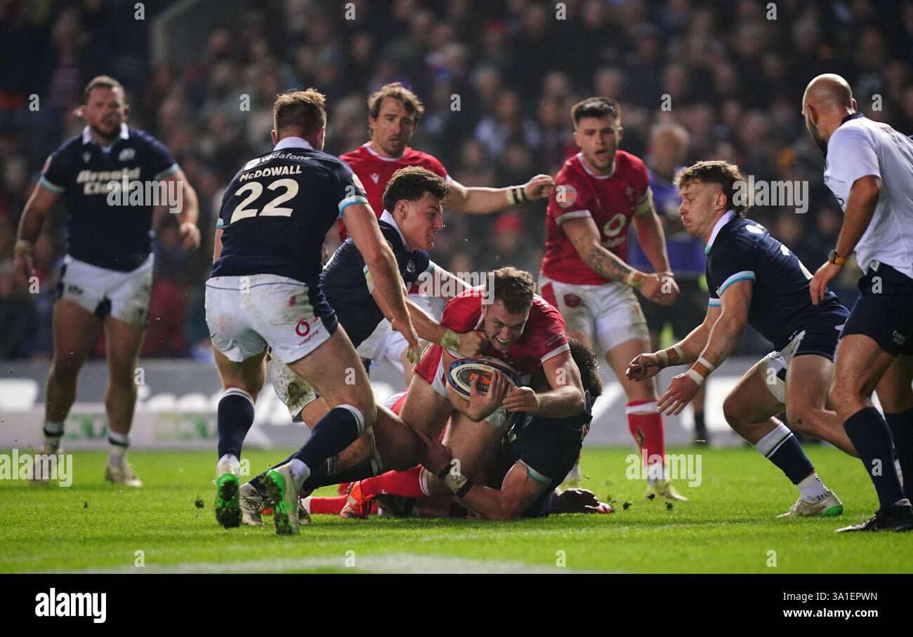 Wales' Max Llewellyn scores their side's fifth try of the game during ...