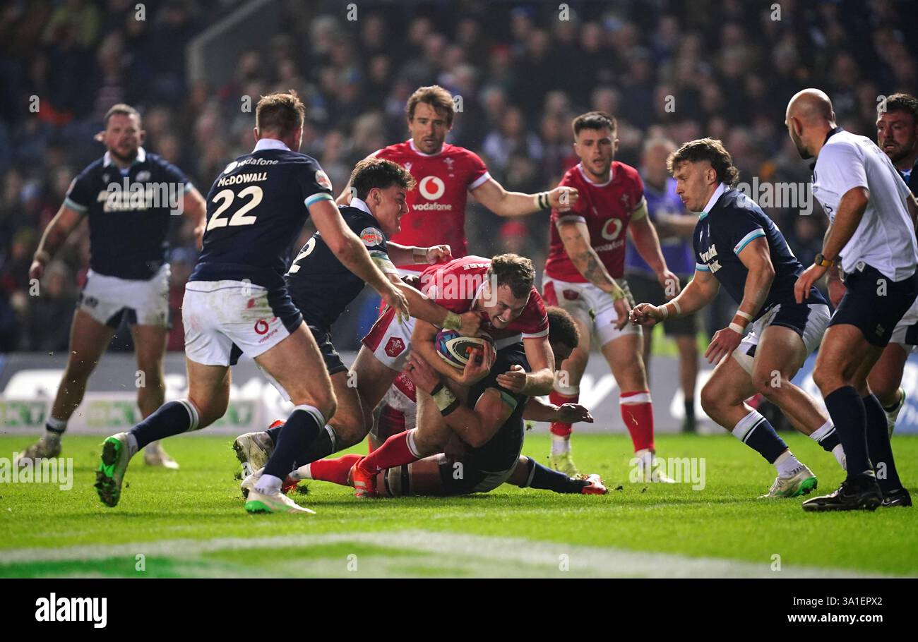 Wales' Max Llewellyn scores their side's fifth try of the game during ...