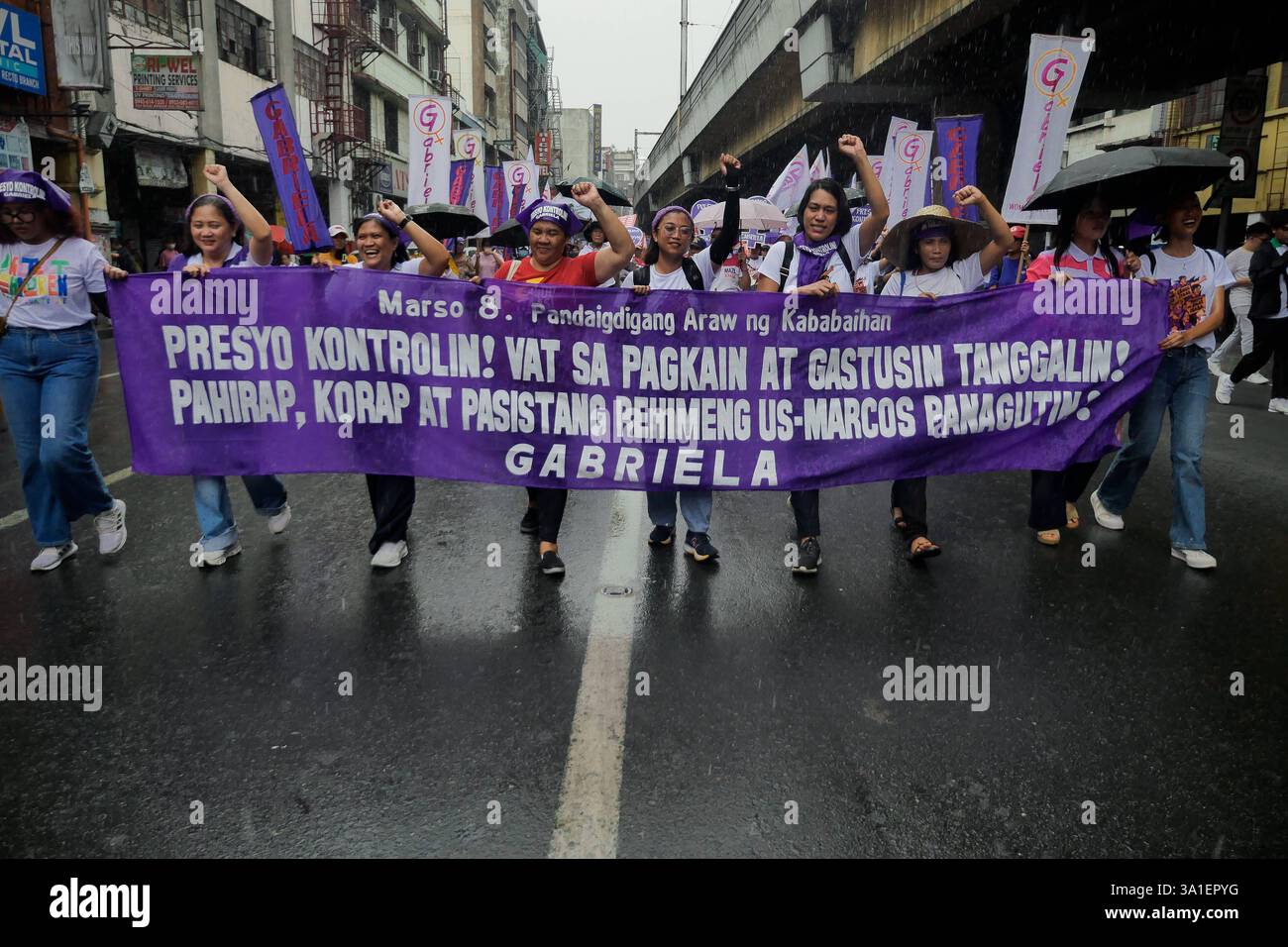 International women s day rally in the Philippines Women take part in ...