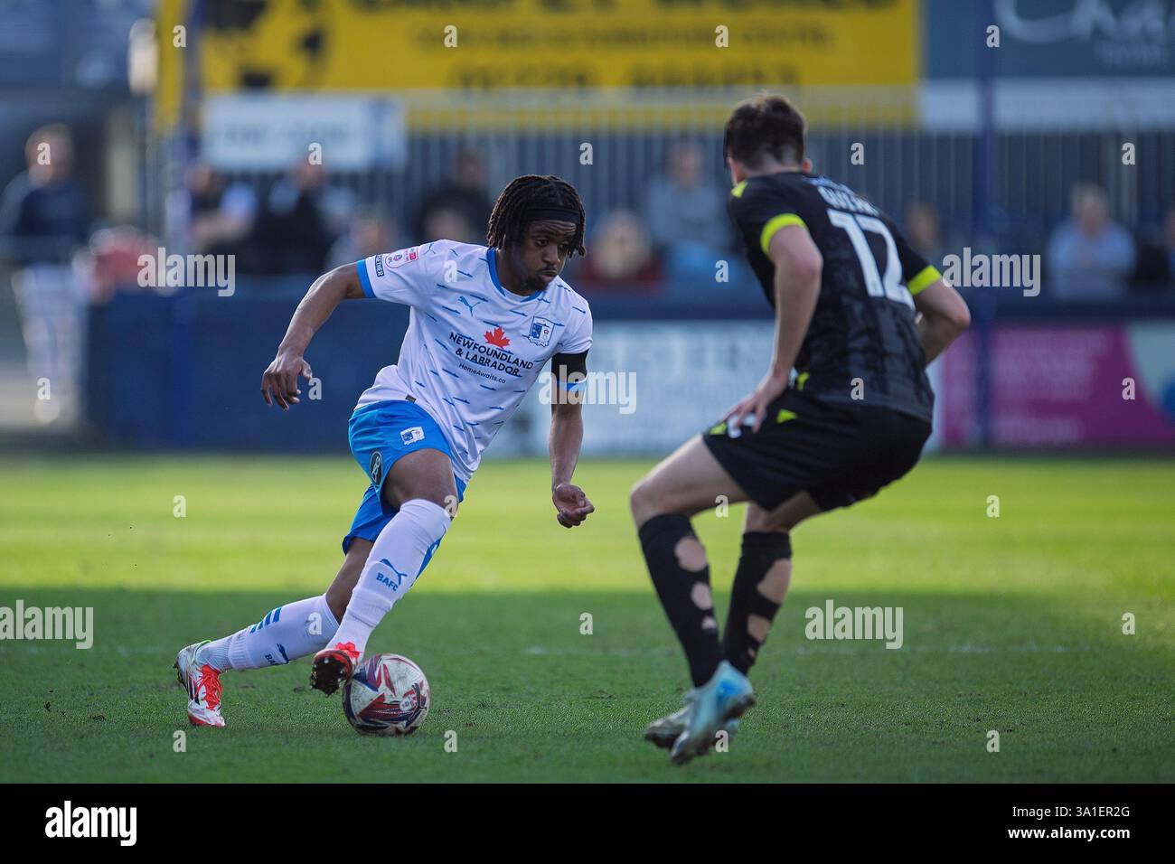Barrow's Leo Duru in action with Accrington Stanley's Seb Quirk during ...