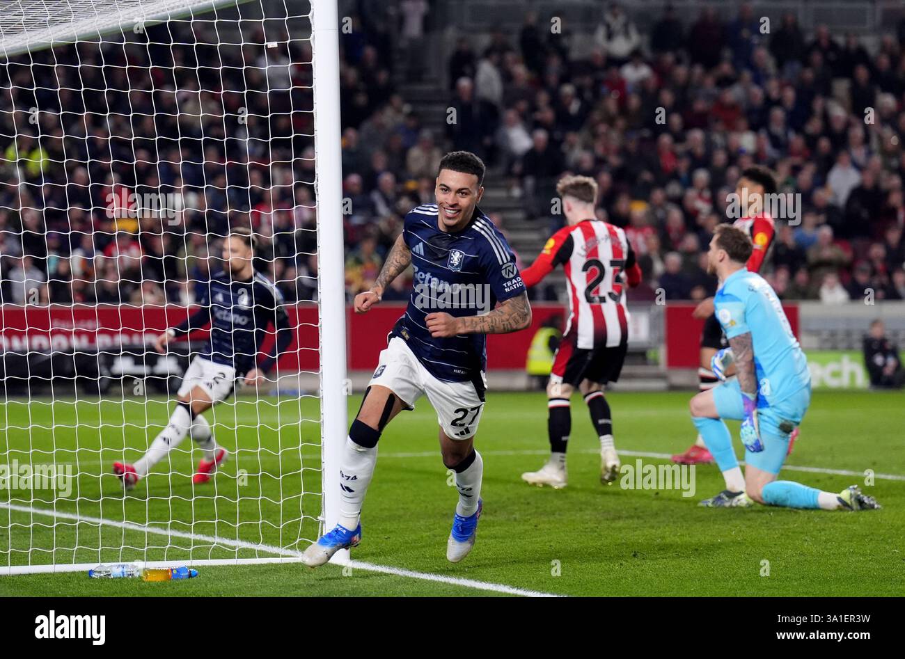 Aston Villa's Morgan Rogers (centre) celebrates but his goal is ...