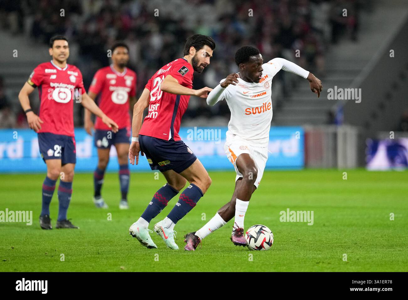 26 Andre GOMES (losc) - 19 Rabby NZINGOULA (mhsc) during the Ligue 1 ...