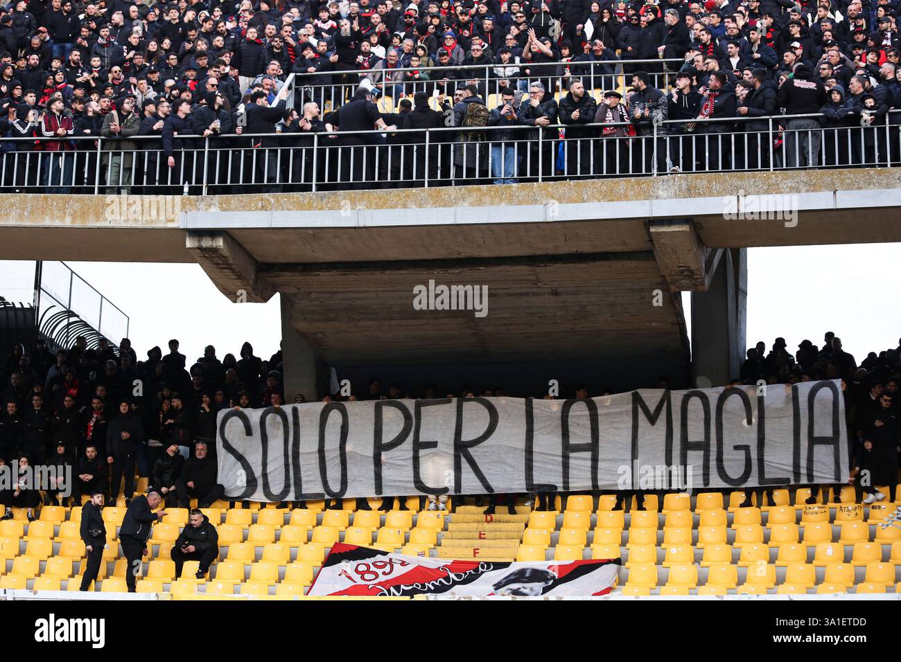 Lecce, Italy. 08th Mar, 2025. AC Milan fans show a protest banner in ...