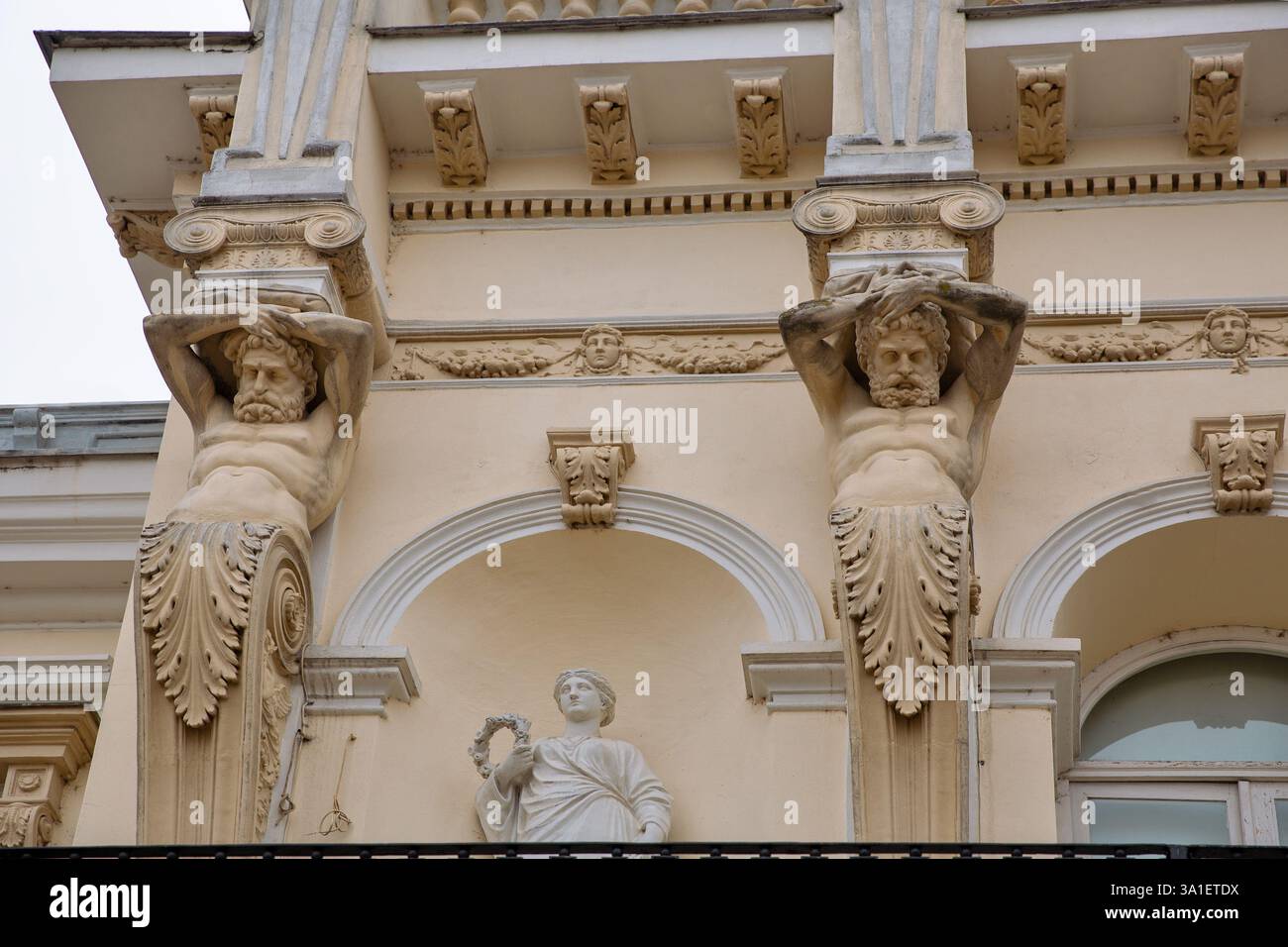 Fragments of ancient architecture in the form of atlantes holding ...