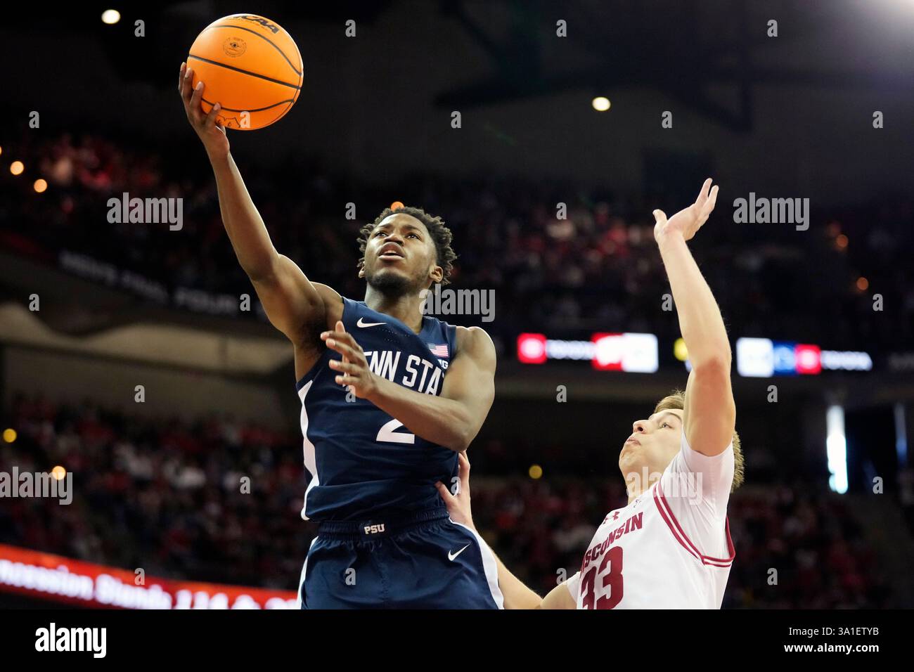 Penn State guard D'Marco Dunn (2) scores against Wisconsin guard Jack ...