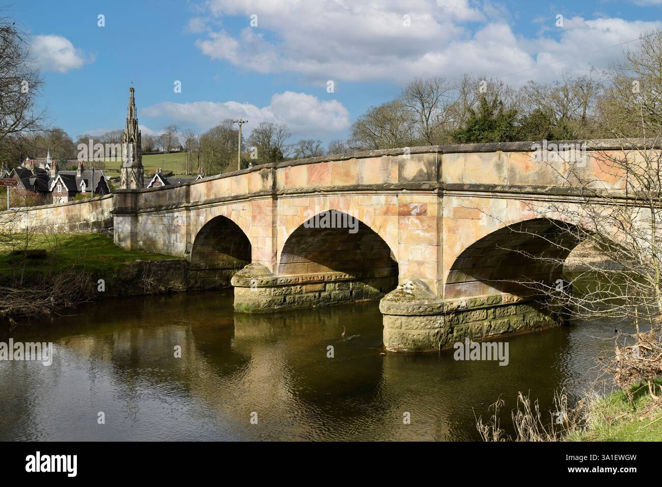 Stone arch bridge over River Manifold in The Staffordshire village of ...