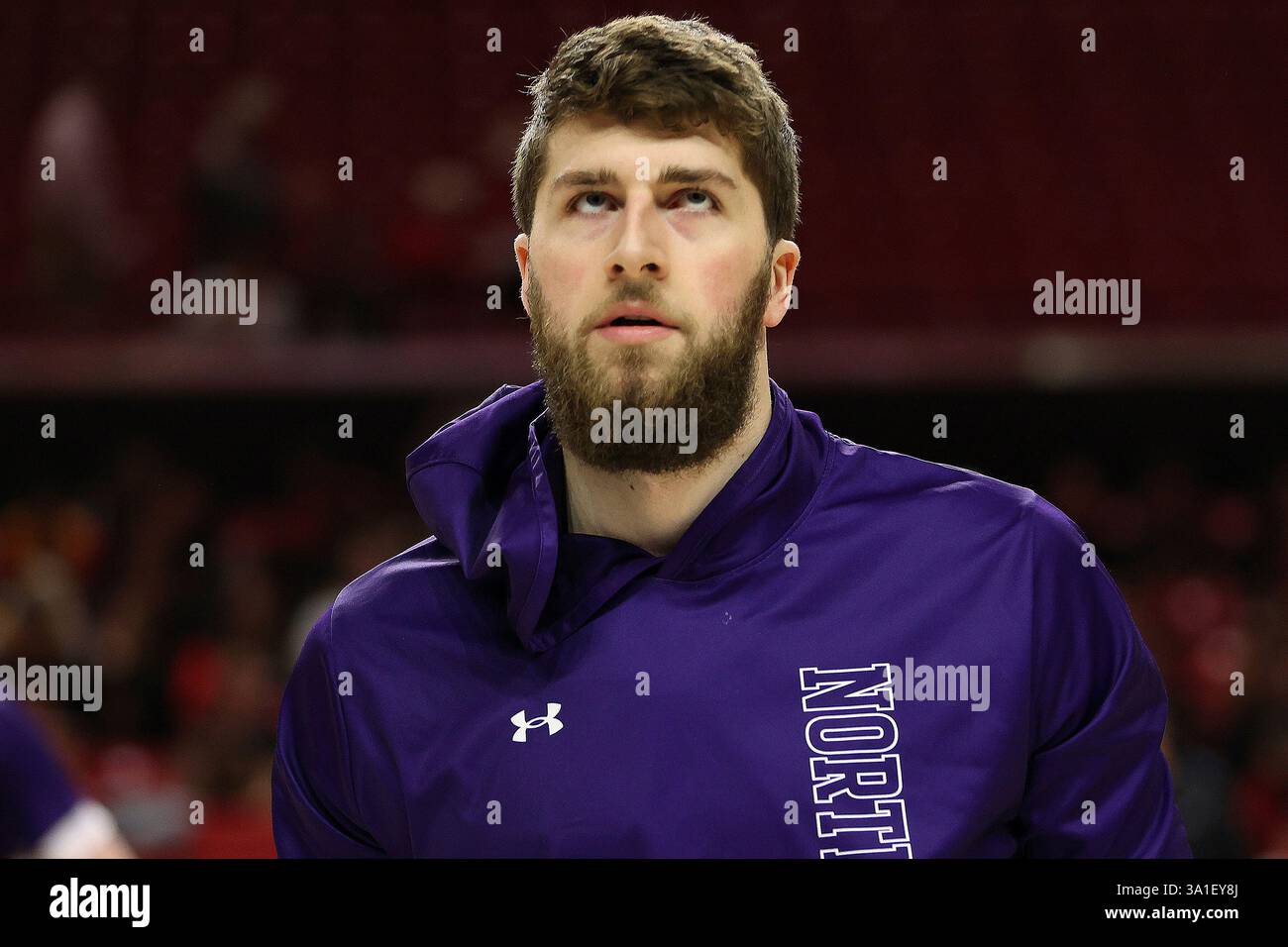 Northwestern center Matthew Nicholson (34) looks on before an NCAA ...