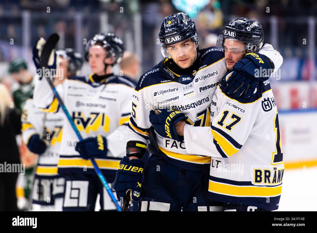 250308 HV71s Radan Lenc och Isac Brännström jublar efter ishockeymatchen i SHL mellan Färjestad ...