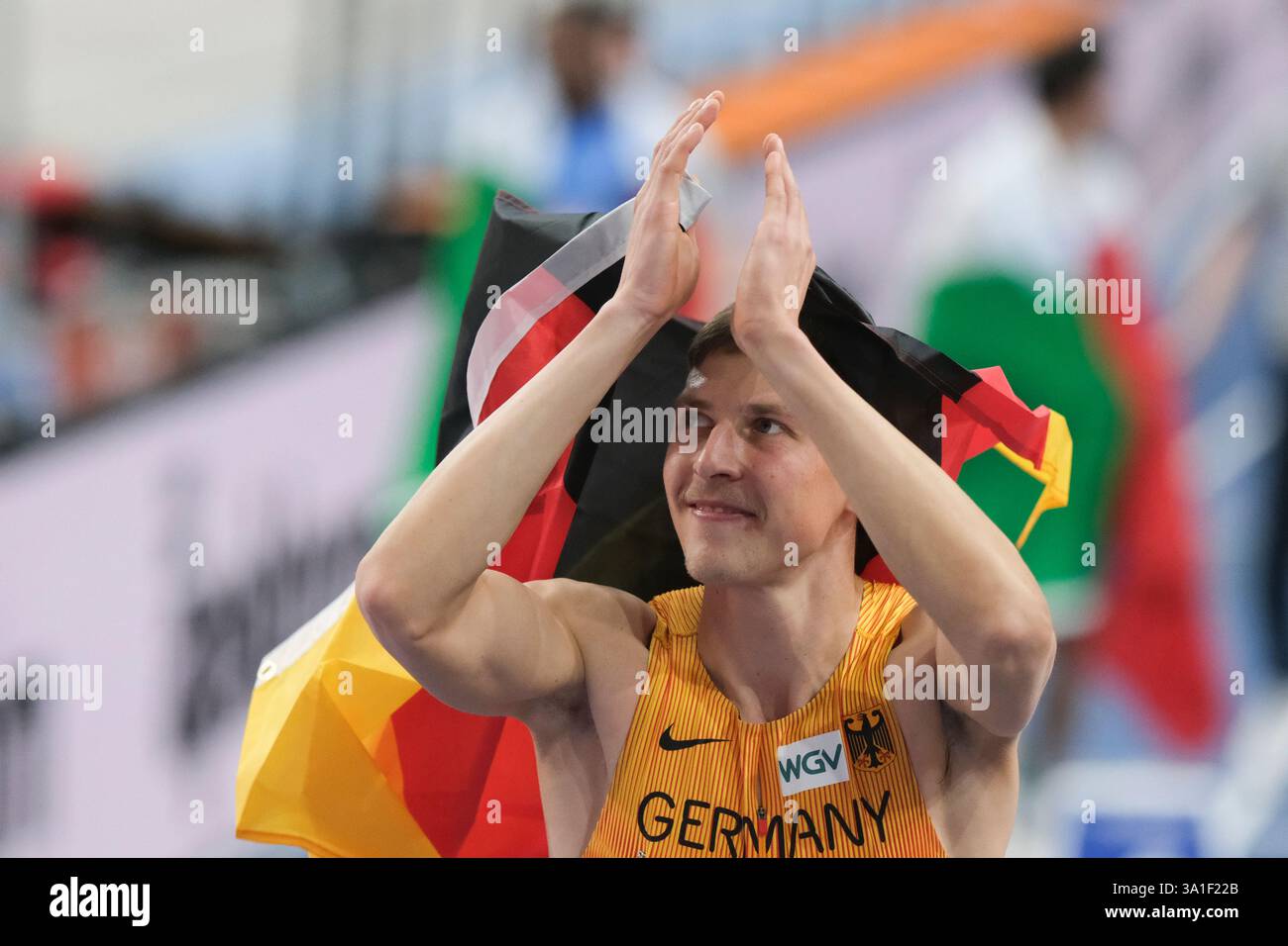 Germany's Max Hess reatcs after winning second place in the tripple ...