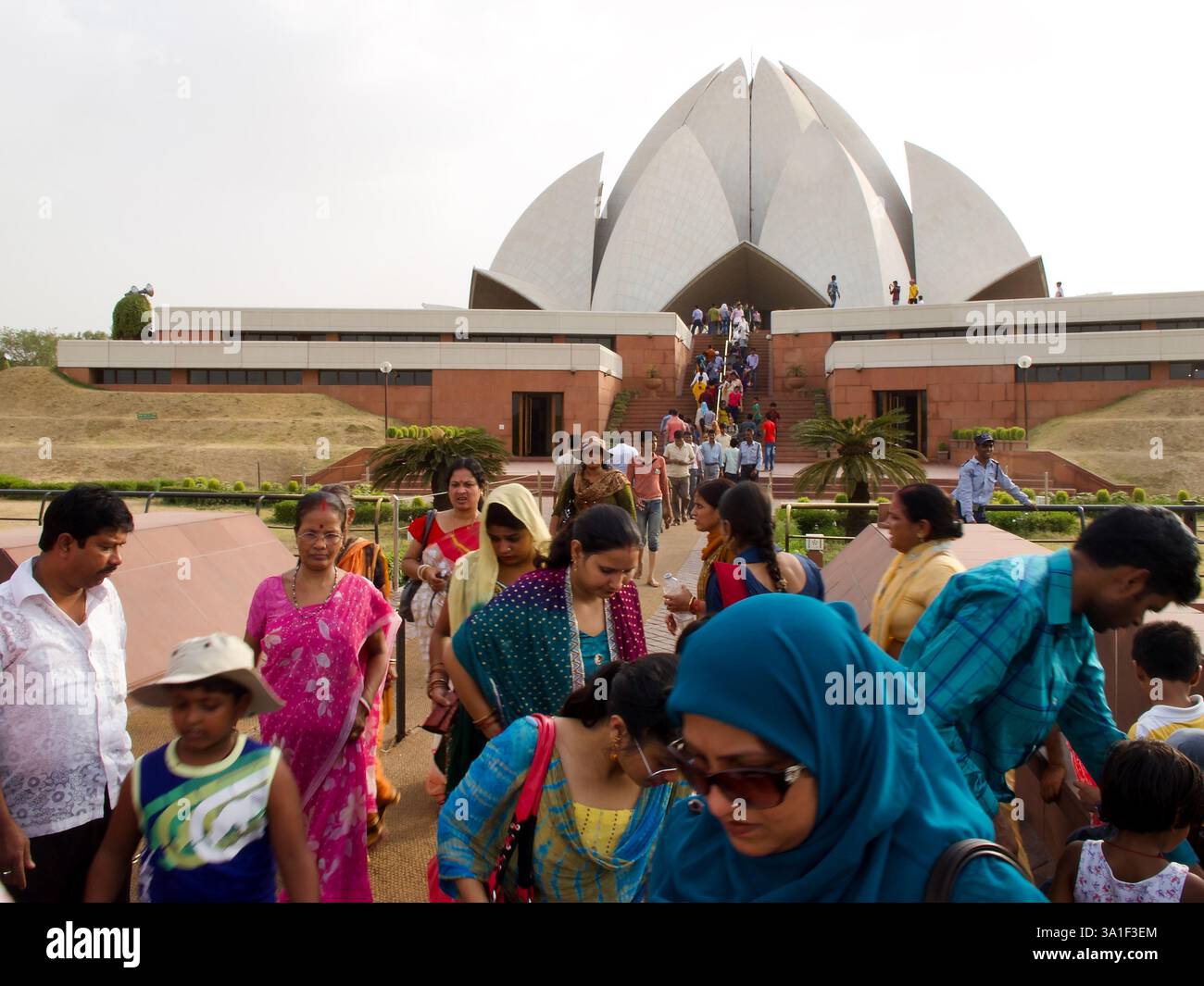 Visitors gather at the Lotus Temple in Delhi, India, a Bahá’í House of ...