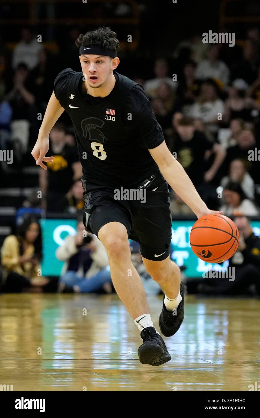 Michigan State forward Frankie Fidler drives up court during the first ...