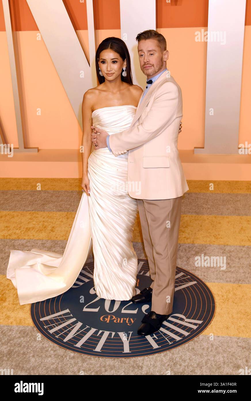 BEVERLY HILLS, CALIFORNIA - MARCH 02: (L-R) Brenda Song and Macaulay ...