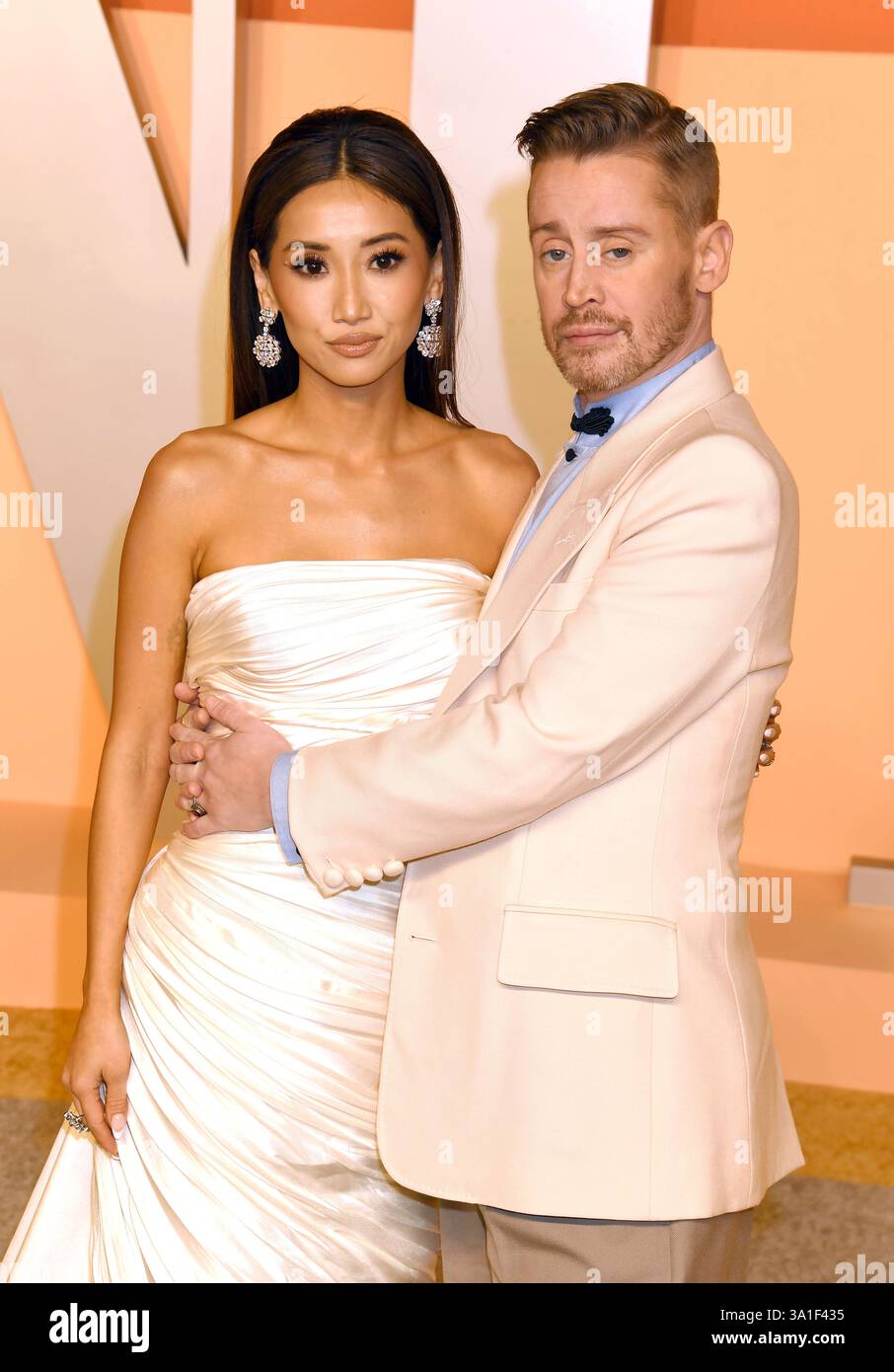 BEVERLY HILLS, CALIFORNIA - MARCH 02: (L-R) Brenda Song and Macaulay ...