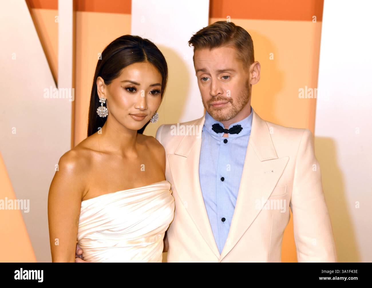 BEVERLY HILLS, CALIFORNIA - MARCH 02: (L-R) Brenda Song and Macaulay ...
