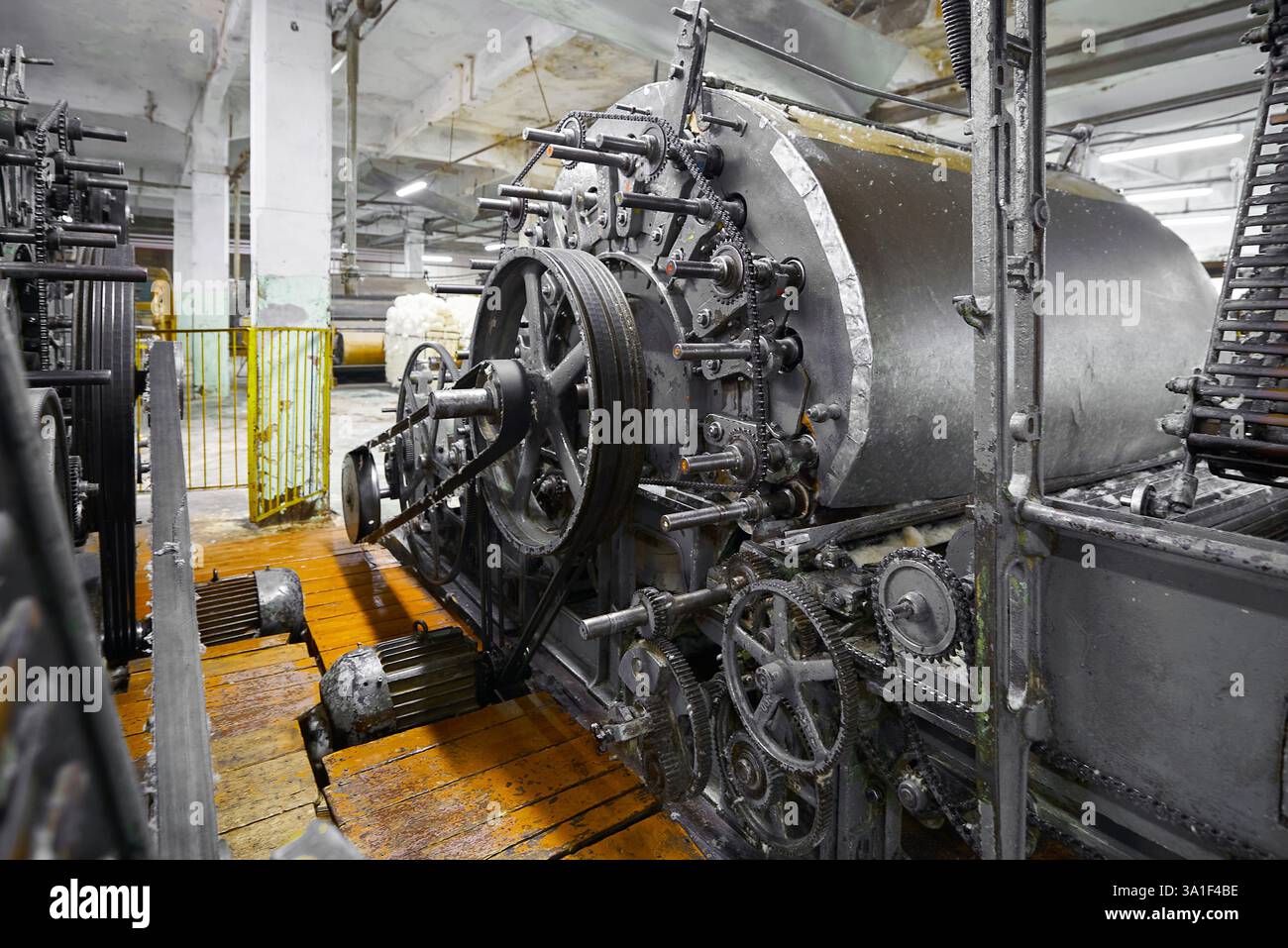 Old-fashioned carding machine showcasing intricate gears and mechanisms ...