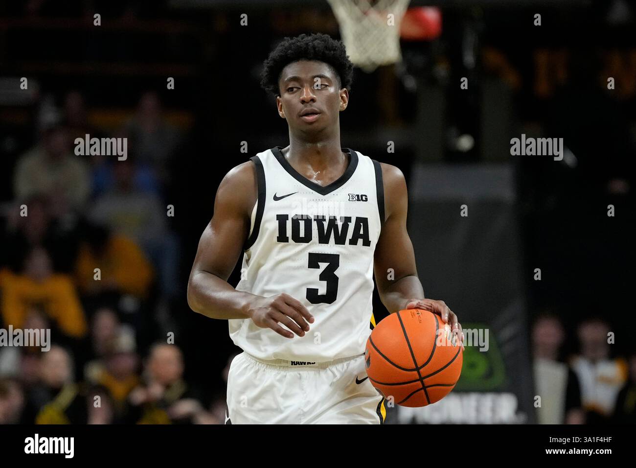 Iowa guard Drew Thelwell drives up court during the second half of an ...