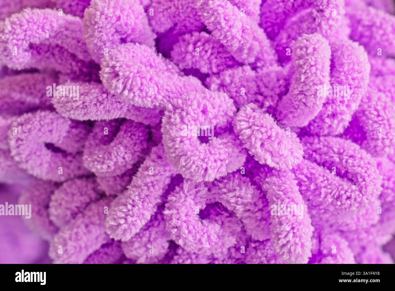 lilac purple textured background made of knitting threads Stock Photo ...