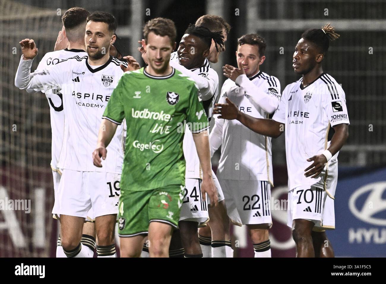 Eupen's Wedingo celebrates after scoring during a soccer match between ...