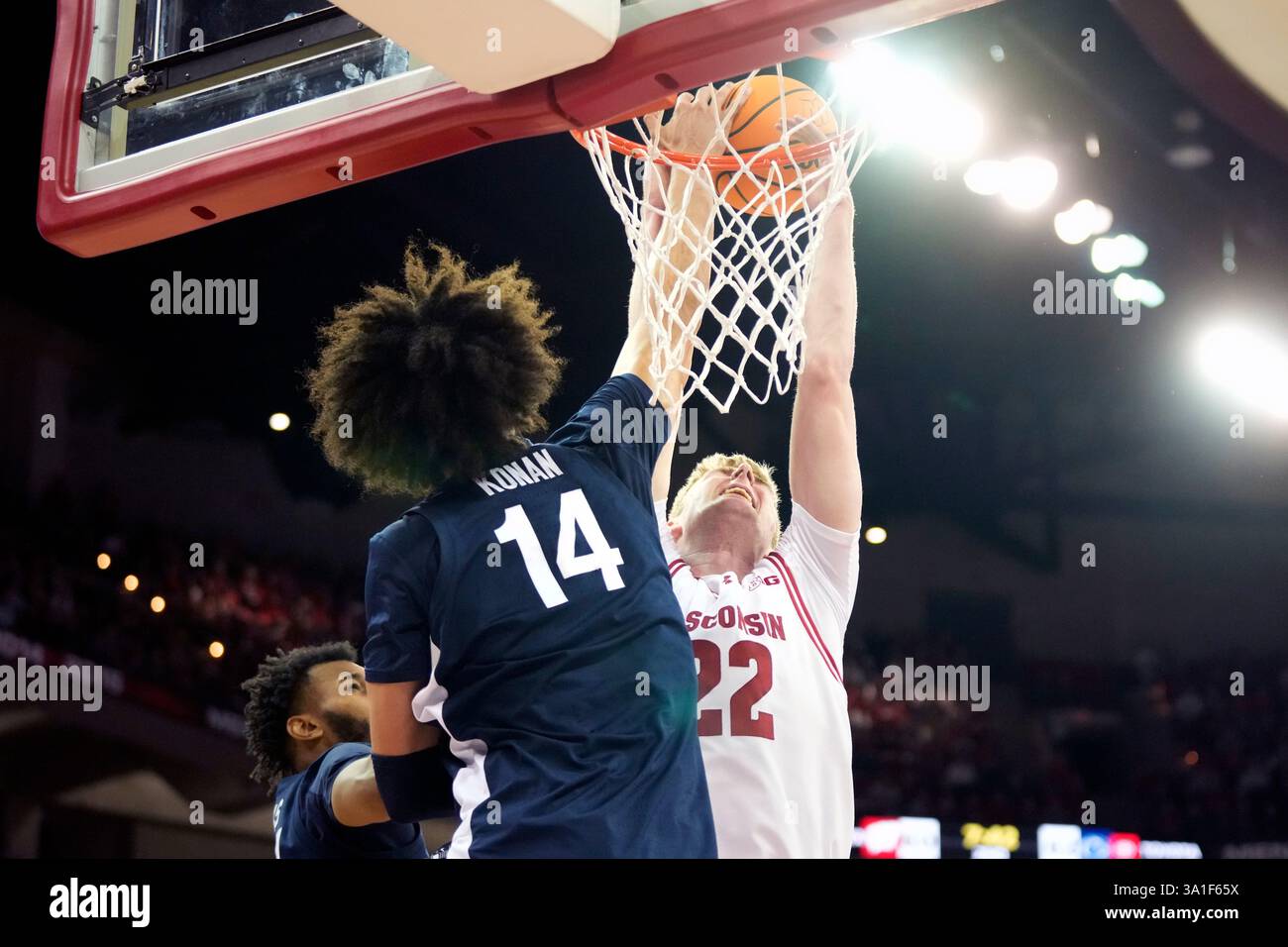 Penn State forward Yanic Konan Niederhauser (14) blocks a dunk by ...