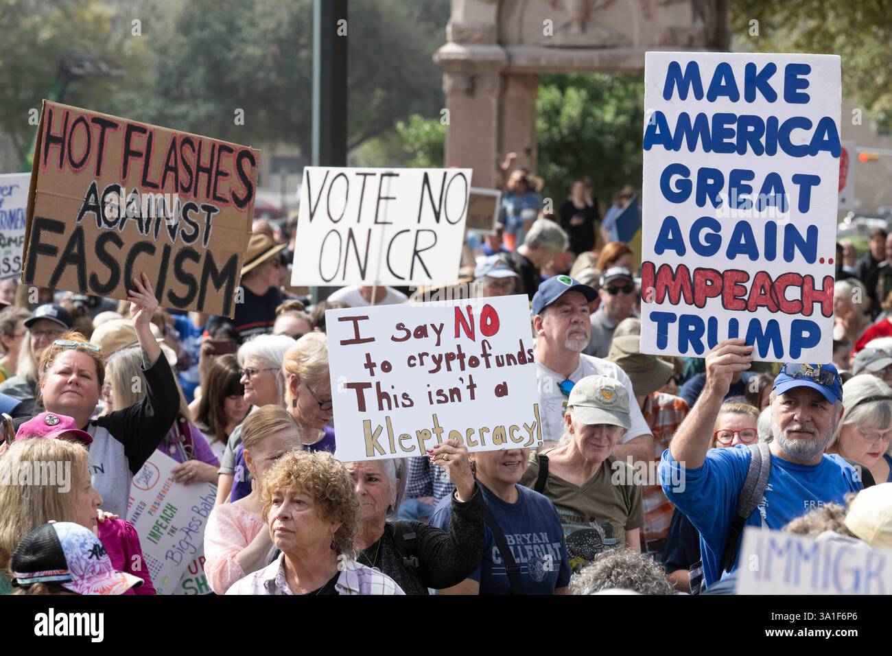 Austin Texas USA, March 8 2025: Protesters hold anti-Donald Trump and ...