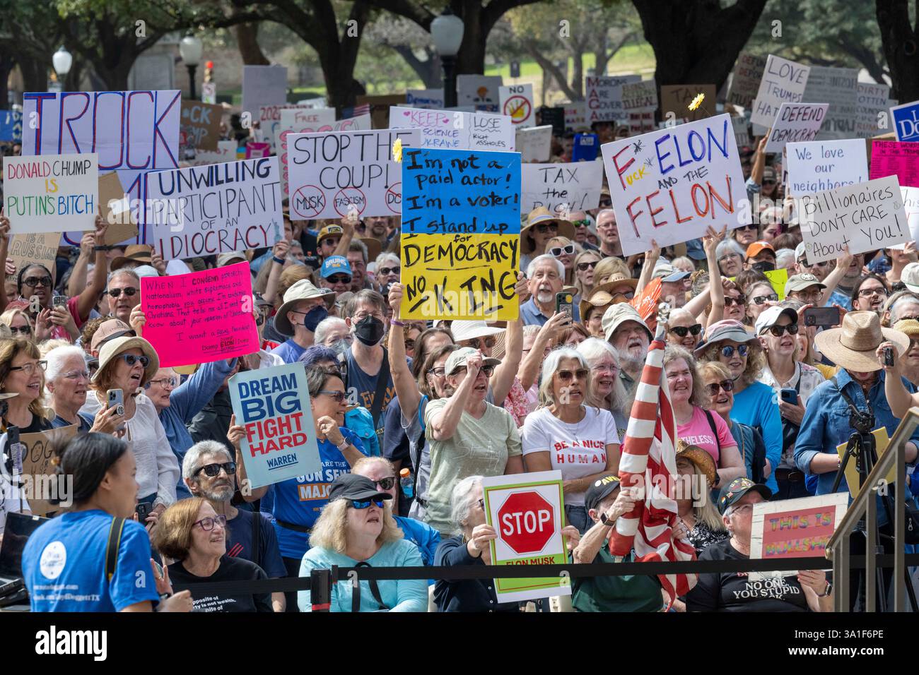 Austin Texas USA, March 8 2025: Protesters hold anti-Donald Trump and ...