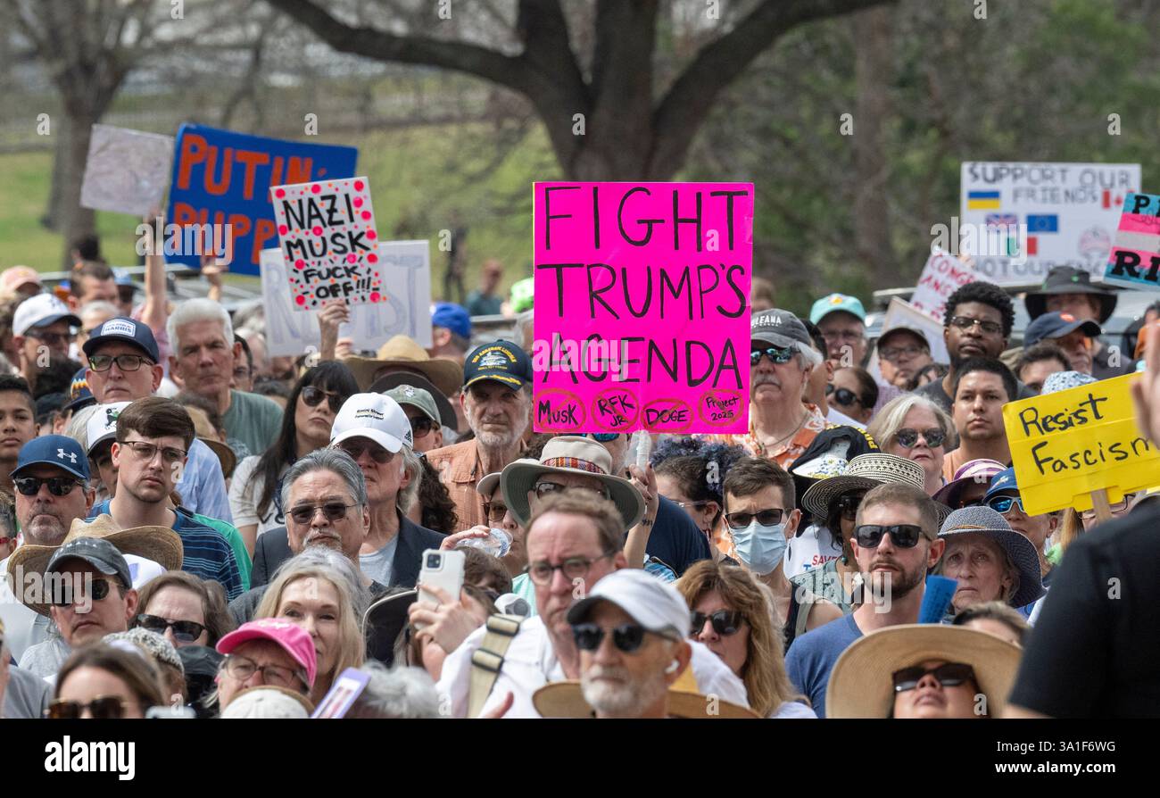 Austin Texas USA, March 8 2025: Protesters hold anti-Donald Trump and ...