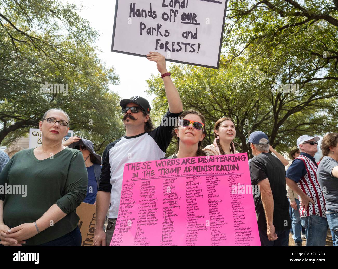 Austin Texas USA, March 8 2025: Protesters hold anti-Donald Trump and ...