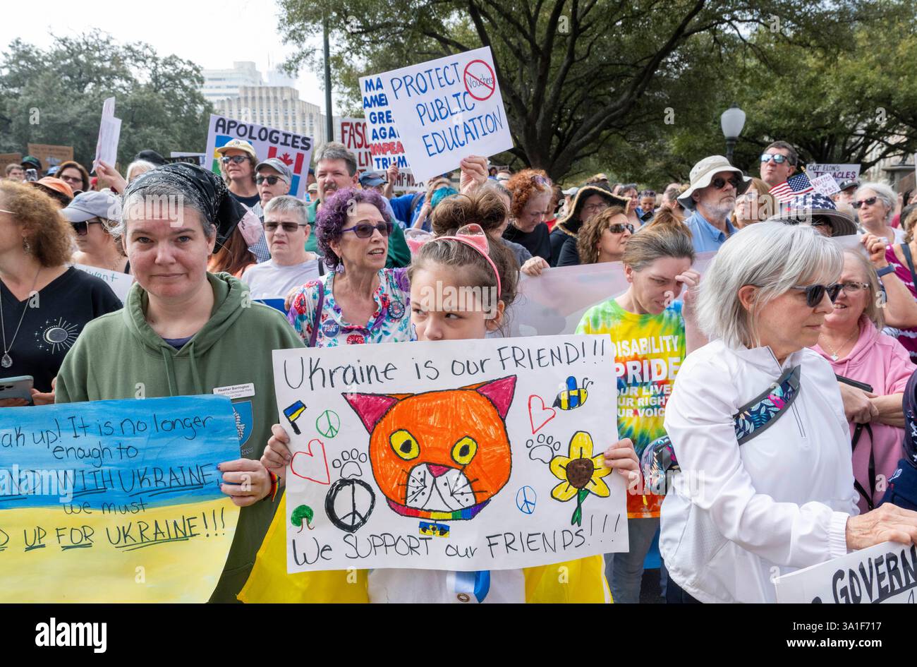 Austin Texas USA, March 8 2025: Protesters hold anti-Donald Trump and ...