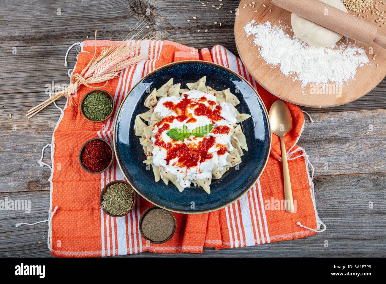 Turkish Manti dish. Turkish traditional food ravioli with yoghurt and ...