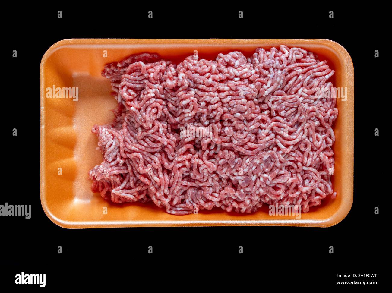 Raw ground meat minced in foam food container. Retail market sale ...