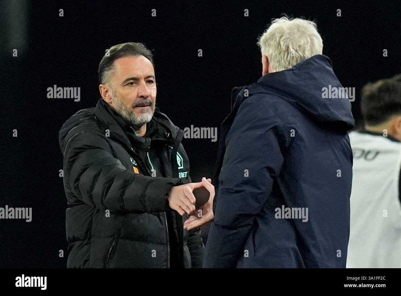 Managers at the full time whistle after the Premier League match at ...