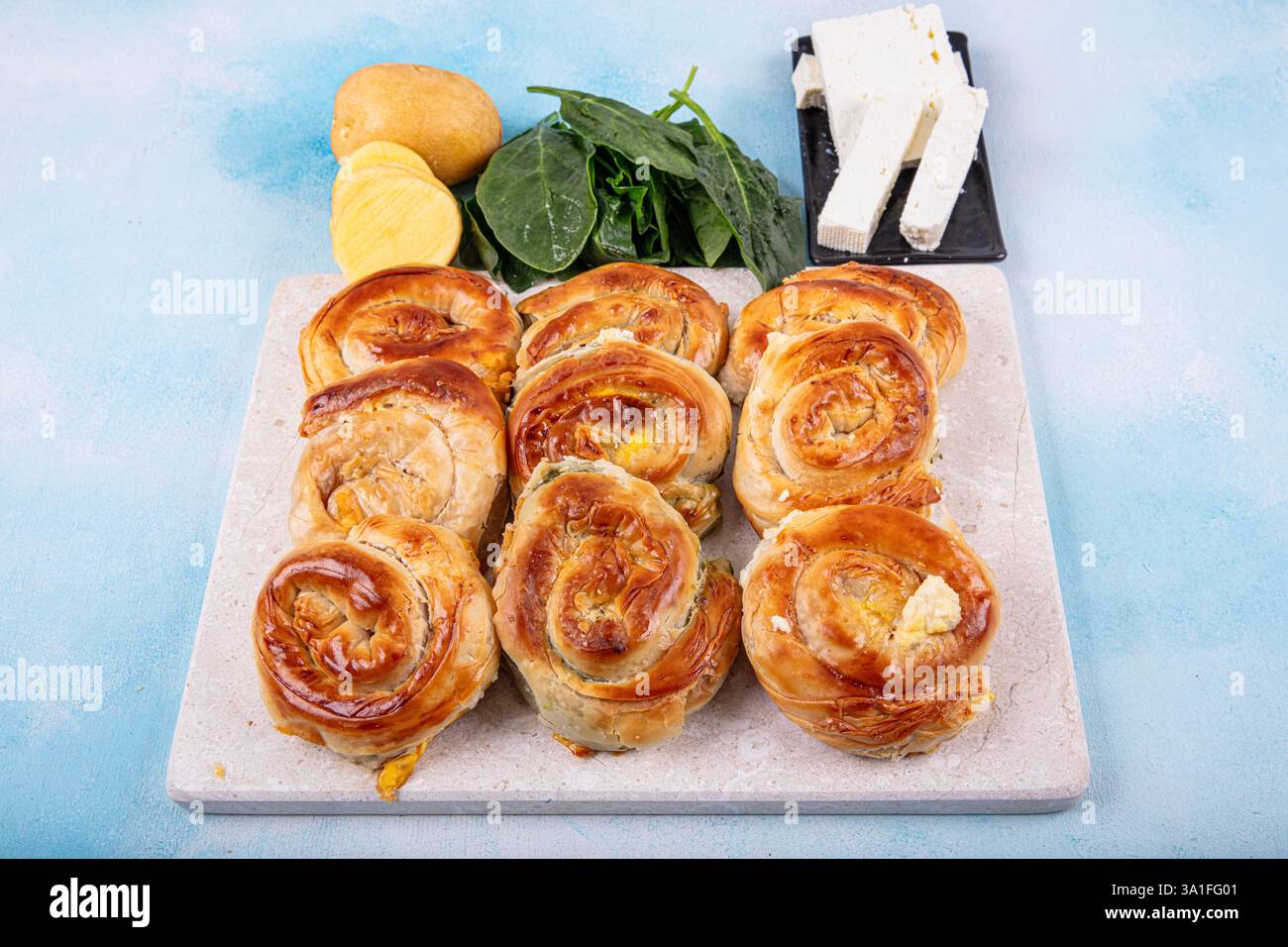 Traditional delicious Turkish burek with spinach, cheese and potatoes ...