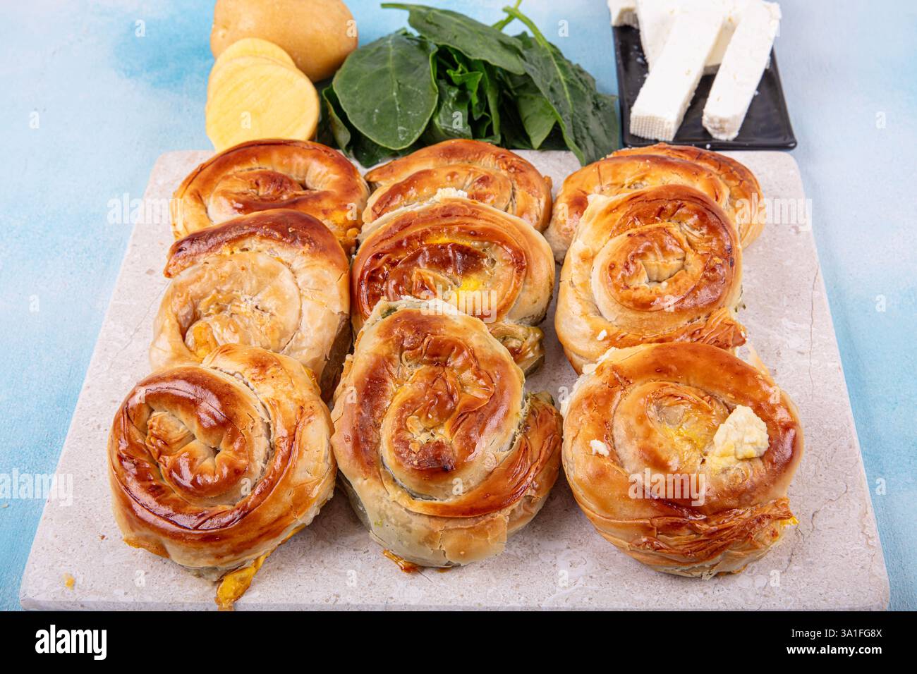 Traditional delicious Turkish burek with spinach, cheese and potatoes ...