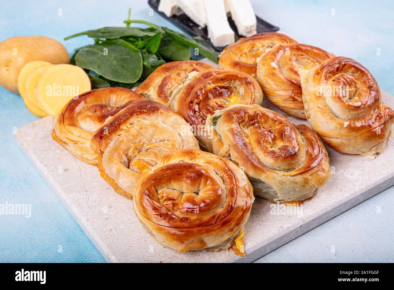 Traditional delicious Turkish burek with spinach, cheese and potatoes ...