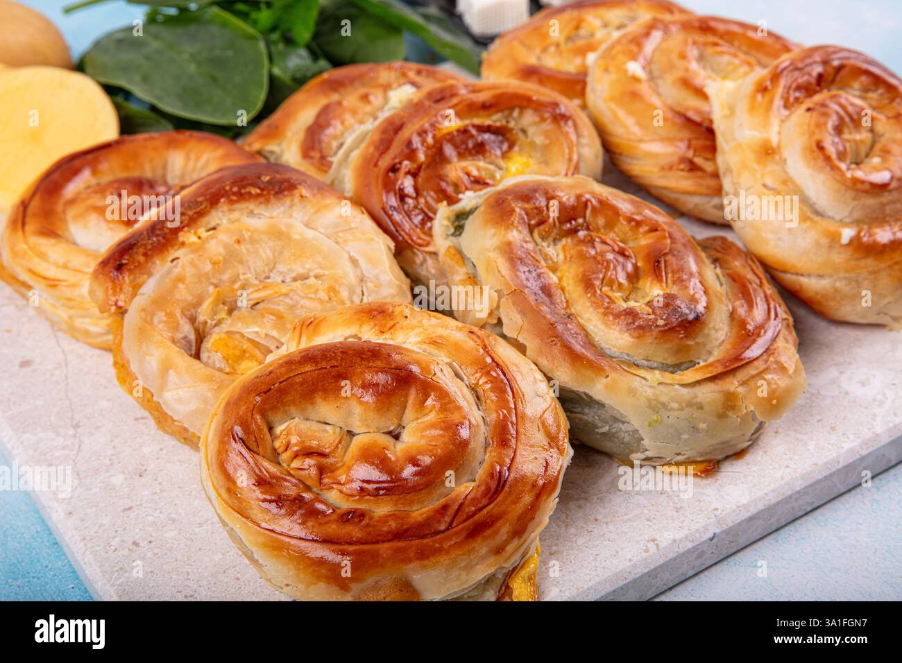 Traditional delicious Turkish burek with spinach, cheese and potatoes ...