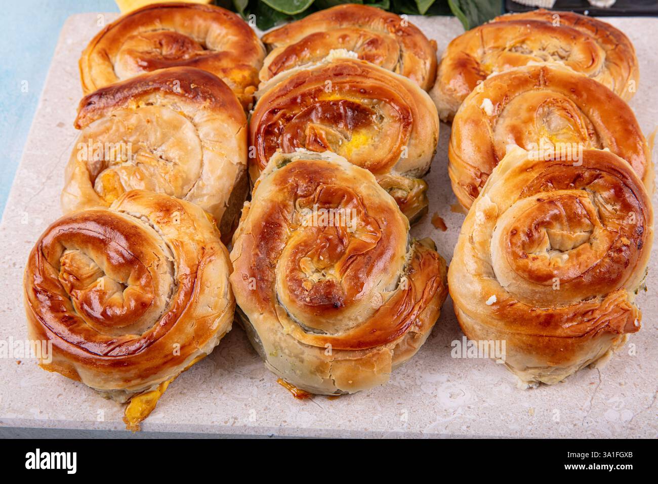 Traditional delicious Turkish burek with spinach, cheese and potatoes ...